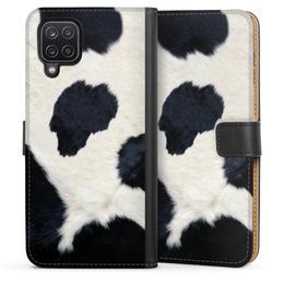 DeinDesign Galaxy A12 Handy Klapph&uuml;lle Handyh&uuml;lle aus Kunst Leder schwarz Flip Case Animal Look Animal Print Cow Skin Sideflip mit langer Lasche