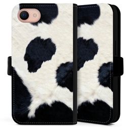 DeinDesign iPhone 16e Handy Klapph&uuml;lle Handyh&uuml;lle aus Kunst Leder schwarz Flip Case Animal Look Animal Print Cow Skin Sideflip mit Lasche