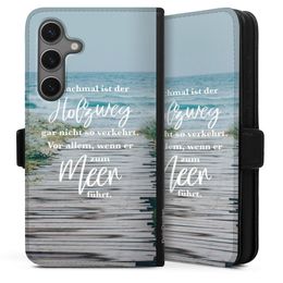 DeinDesign Galaxy S25 Handy Klapph&uuml;lle Handyh&uuml;lle aus Kunst Leder schwarz Flip Case Statement Beach Spruch Sideflip mit Lasche