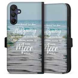 DeinDesign Galaxy A15 Handy Klapph&uuml;lle Handyh&uuml;lle aus Kunst Leder schwarz Flip Case Statement Beach Spruch Sideflip mit Lasche