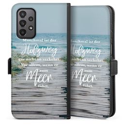 DeinDesign Galaxy A23 5G Handy Klapph&uuml;lle Handyh&uuml;lle aus Kunst Leder schwarz Flip Case Spruch Beach Statement Sideflip mit Lasche