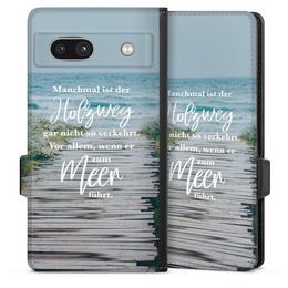 DeinDesign Google Pixel 7a Handy Klapph&uuml;lle Handyh&uuml;lle aus Kunst Leder schwarz Flip Case Spruch Beach Statement Sideflip mit Lasche
