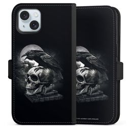 DeinDesign iPhone 15 Handy Klapph&uuml;lle Handyh&uuml;lle aus Kunst Leder schwarz Flip Case Raven Skulls Skull Sideflip mit Lasche