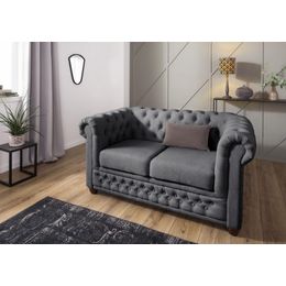 Chesterfield-Sofa Home Affaire "New Castle", schwarz, B:148cm H:72cm T:86cm, Sofas, mit hochwertiger Knopfheftung in Chesterfield-Design, B/T/H: 148/86/72