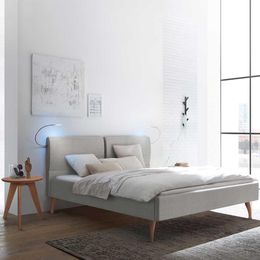 Pharao24.de Breites Bett 140x200 cm im Skandi Design Webstoff und Kernbuche massiv