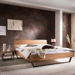 Pharao24.de Industrial Bett 140x200 aus Wildeiche Massivholz Bügelgestell