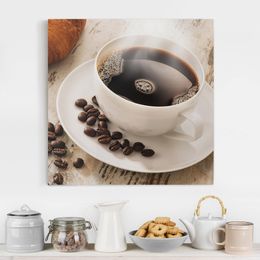 Leinwandbild K&uuml;che Dampfende Kaffeetasse mit Kaffeebohnen