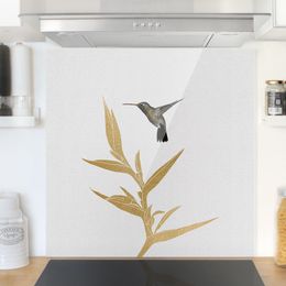 Bilderwelten Glas Spritzschutz Tropisch gold Tiere - Kolibri und tropische goldene Bl&uuml;te II - Pflanzen K&uuml;chenr&uuml;ckwand aus Glas