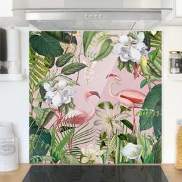 Bilderwelten Glas Spritzschutz Tropisch rosa Tiere - Tropische Flamingos mit Pflanzen in Rosa - Pflanzen K&uuml;chenr&uuml;ckwand aus Glas