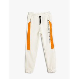 KOTON Hose Jungen Größe 146/152 ecru / orange / schwarz