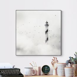 Wechselbild Leuchtturm im Nebel