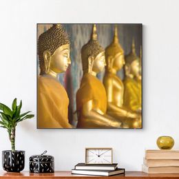 Wechselbild Goldene Buddha Statuen
