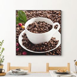 Wechselbild Kaffeetasse mit ger&ouml;steten Kaffeebohnen