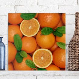 Bilderwelten Leinwandbild - Quadrat Saftige Orangen