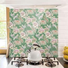Bilderwelten Glas Spritzschutz Illustration gr&uuml;n Tiere Aquarell - Aquarell V&ouml;gel mit gro&szlig;en Bl&uuml;ten vor Gr&uuml;n - V&ouml;gel K&uuml;chenr&uuml;ckwand aus Glas