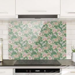 Bilderwelten Glas Spritzschutz Illustration gr&uuml;n Tiere Aquarell - Aquarell V&ouml;gel mit gro&szlig;en Bl&uuml;ten vor Gr&uuml;n - V&ouml;gel K&uuml;chenr&uuml;ckwand aus Glas