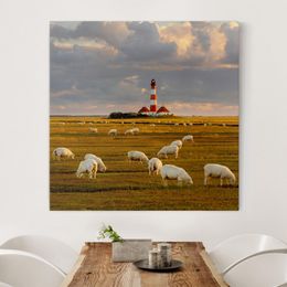 Bilderwelten Leinwandbild - Quadrat Nordsee Leuchtturm mit Schafsherde