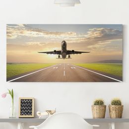 Bilderwelten Leinwandbild - Querformat Startendes Flugzeug
