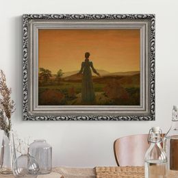 Bilderwelten Leinwandbild mit Barockrahmen Caspar David Friedrich - Frau vor untergehender Sonne