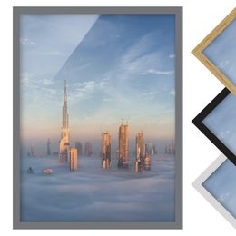 Bilderwelten Bild mit Rahmen - Hochformat Dubai &uuml;ber den Wolken