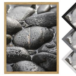 Bilderwelten Bild mit Rahmen - Hochformat Schwarze Steine im Wasser
