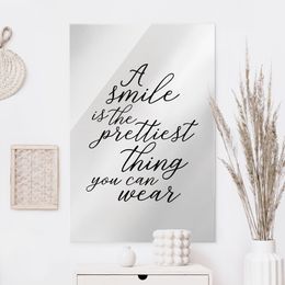 Glasbild A smile is the prettiest thing