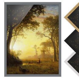 Bilderwelten Bild mit Rahmen - Hochformat Albert Bierstadt - Sonnenbeschienene Lichtung