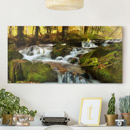 Bilderwelten Leinwandbild - Querformat Wasserfall herbstlicher Wald