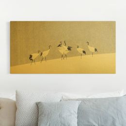 Leinwandbild Kraniche im Schnee