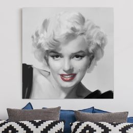 Leinwandbild Schwarz-Wei&szlig; Marilyn auf Sofa