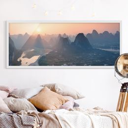 Bild mit Rahmen Sonnenaufgang in Berglandschaft