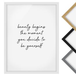 Bild mit Rahmen Typografie Beauty Begins Zitat
