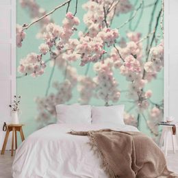 Fototapete Kirschbl&uuml;tentanz auf Leinenstruktur - Vliestapete nach Ma&szlig; Blumen Floral Wohnzimmer Schlafzimmer Bad Badezimmer K&uuml;che Flur Esszimmer Beige