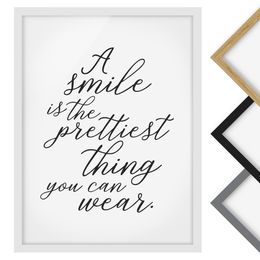 Spruch Bild mit Rahmen A smile is the prettiest thing