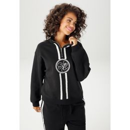 Sweatshirt Aniston CASUAL, Damen, Gr. 34, schwarz-weiß (schwarz, weiß), angeraute Sweatware, Obermaterial: 80% Baumwolle, 20% Polyester, bestickt, kontrastfarbene Details, lässig geschnitten hüftlang, Rippbündchen, Sweatshirts, aufwändig mit Stickerei und Spitzenbändern verziert - NEUE KOLLEKTION