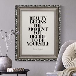 Gerahmtes Leinwandbild Be yourself Coco Chanel in Creme