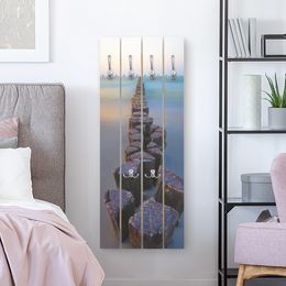 Bilderwelten Wandgarderobe Buhnen bei Sonnenuntergang am Meer