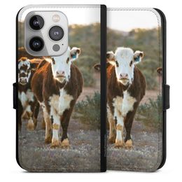 DeinDesign iPhone 14 Pro Handy Klapph&uuml;lle Handyh&uuml;lle aus Kunst Leder schwarz Flip Case Cow Farmer Calf Sideflip mit langer Lasche