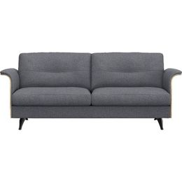 FLEXLUX 2, 5-Sitzer »Glow Sofa, Couch, Premium-Sitzkomfort: Kaltschaum & Federkern« Armlehnenblende in geölter Eiche, Fuß schwarz Navy Blue