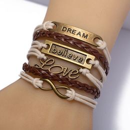 Firetti Armband »Schmuck Messing Leder DREAM believe Love Infinity Unendlichkeit« Made in Germany messingfarben 23 cm Modisches mehrreihiges Armband