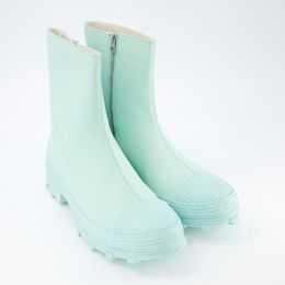 Mintfarbene Stiefel mit dicker Sohle
