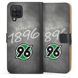DeinDesign Galaxy A12 Handy Klapph&uuml;lle Handyh&uuml;lle aus Kunst Leder schwarz Flip Case Official Licensed Product Hannover 96 H96 Sideflip mit langer Lasche