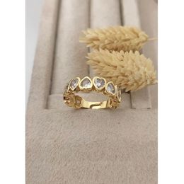 Nakkash Vergold. Ring mit Edelsteinen - 75% | Schmuck