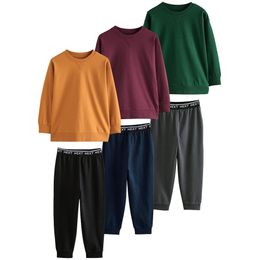 next Schlafanzug Jungen Gr&ouml;&szlig;e 98 dunkelgr&uuml;n / orange / bordeaux / schwarz