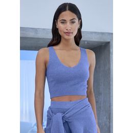 Copenhagen Studios Stricktop blau Gr. 32/34 für Damen. V-Ausschnitt und Label. Figurbetont. Nachhaltig.