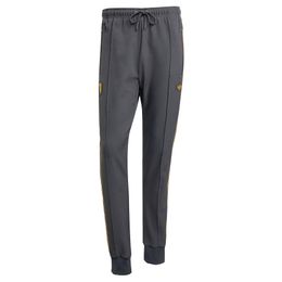 adidas originals Workout Pants 'Manchester United Terrace Icons' male size XS Curry / Black