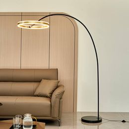 LUCANDE LED-Bogenlampe Yekta, messingfarben, 183 cm, dimmbar