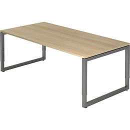 eurokraft pro Schreibtisch mit Gestell aus Vierkant-Stahlrohr, Höhe 650 - 850 mm, BxT 2000 x 1000 mm, Eiche / graphit
