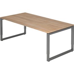 eurokraft pro Schreibtisch mit Gestell aus Vierkant-Stahlrohr, Höhe 650 - 850 mm, BxT 2000 x 1000 mm, Nussbaum / graphit