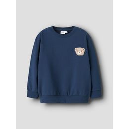 Sweatshirt name it "NMMOCTAVIO LS NREG SWEAT BRU", Jungen, Gr. 116, blau (insignia blau), Sweatware, Obermaterial: 95% Baumwolle, 5% Elasthan, bedruckt, regular fit, Rundhals, Rippb&uuml;ndchen, Sweatshirts Sweatshirt